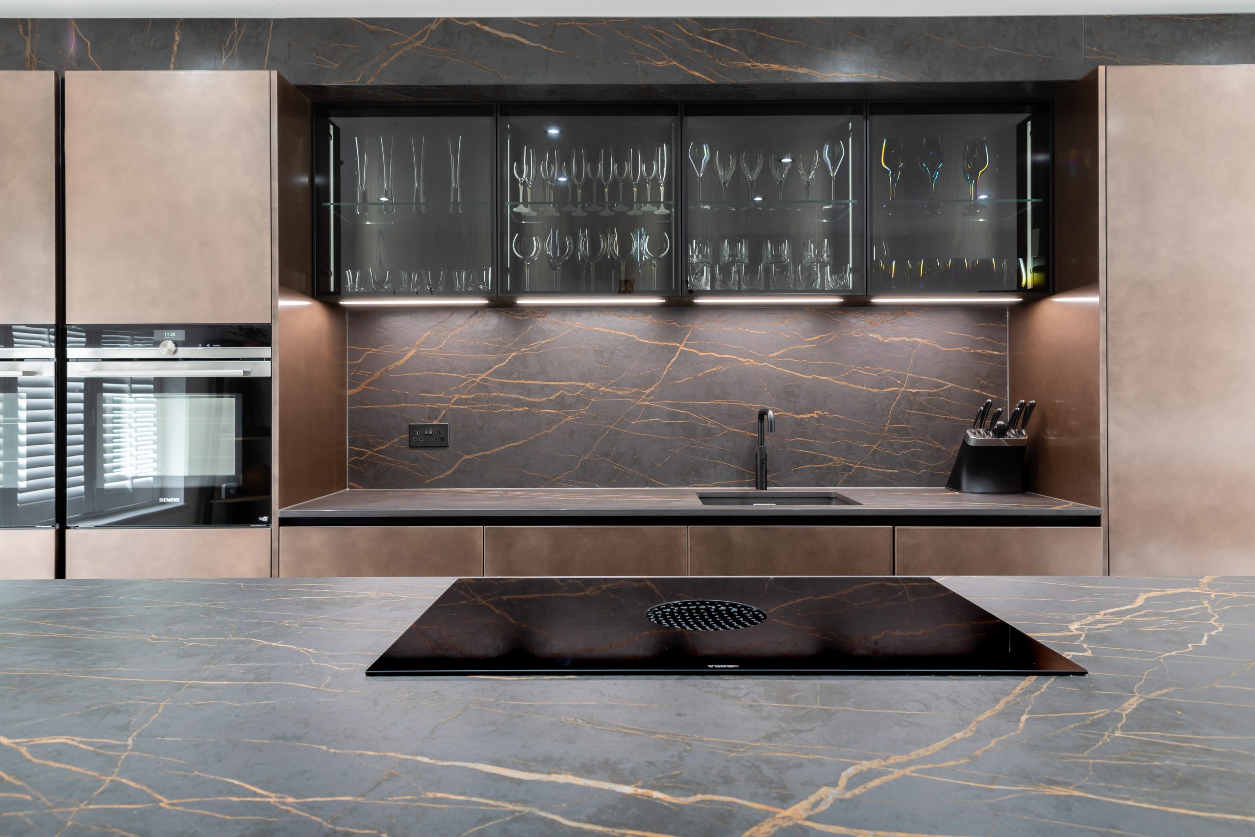 Handleless Carbon Steel & Copper Kitchen With Dekton Laurent Worktops ...